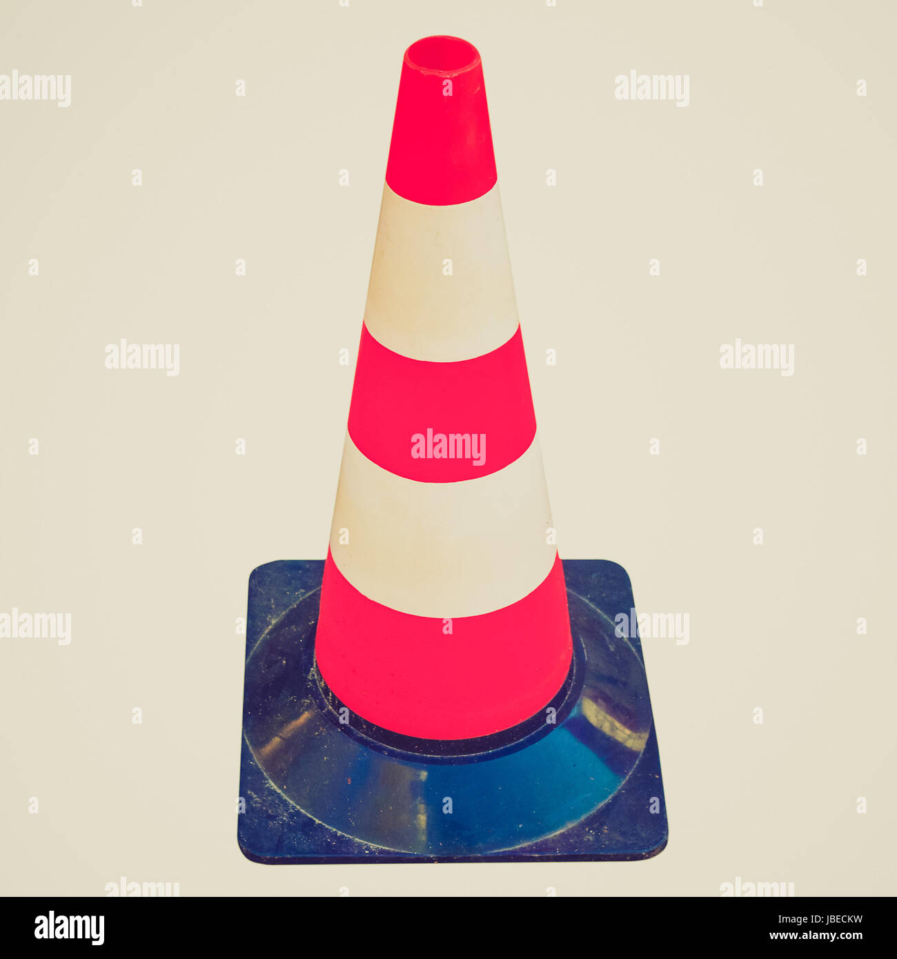 Vintage retro looking Traffic cone isolated over a white background ...