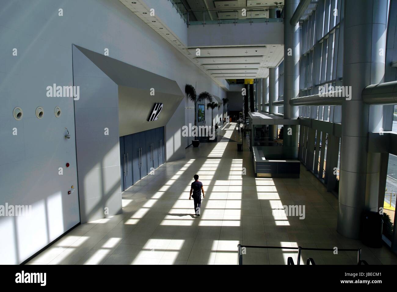 PASAY CITY, PHILIPPINES - MAY 3, 2016: Hallway inside the ground floor ...