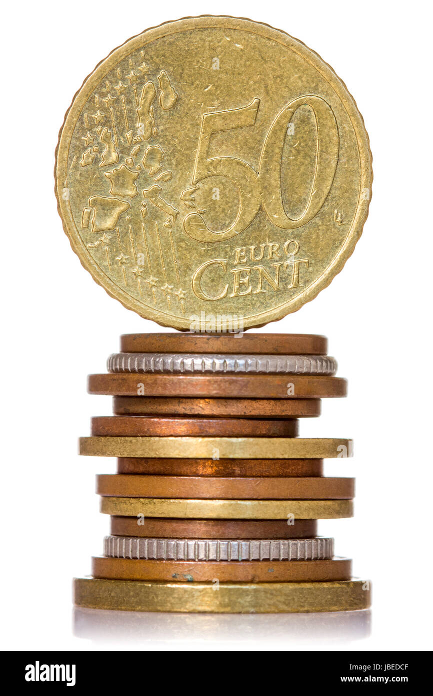 Vertically stacked coins, isolated on white background Stock Photo - Alamy