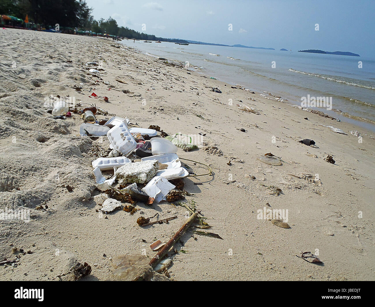 Pollution on the beach of tropical sea. Plastic Stock Photo - Alamy