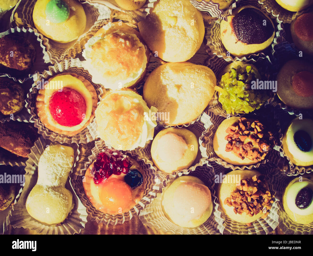 Vintage retro looking Mixed pastries with chocolate, cream, fruit Stock ...