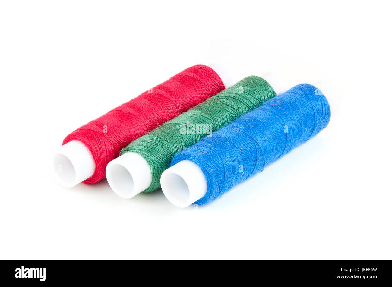 Spools of threads in RGB colors isolated on white background Stock ...