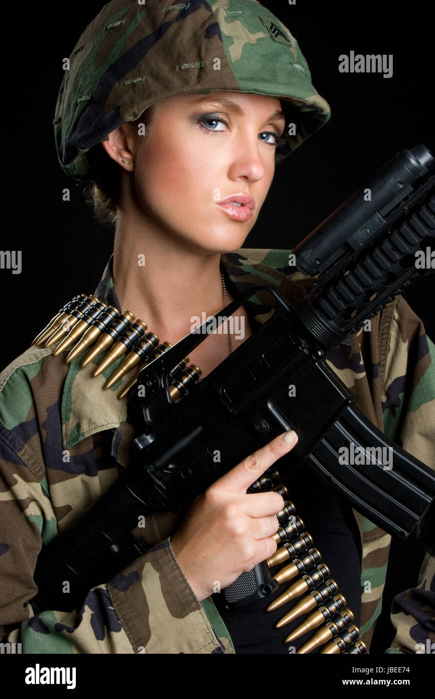 Beautiful army military gun woman Stock Photo - Alamy