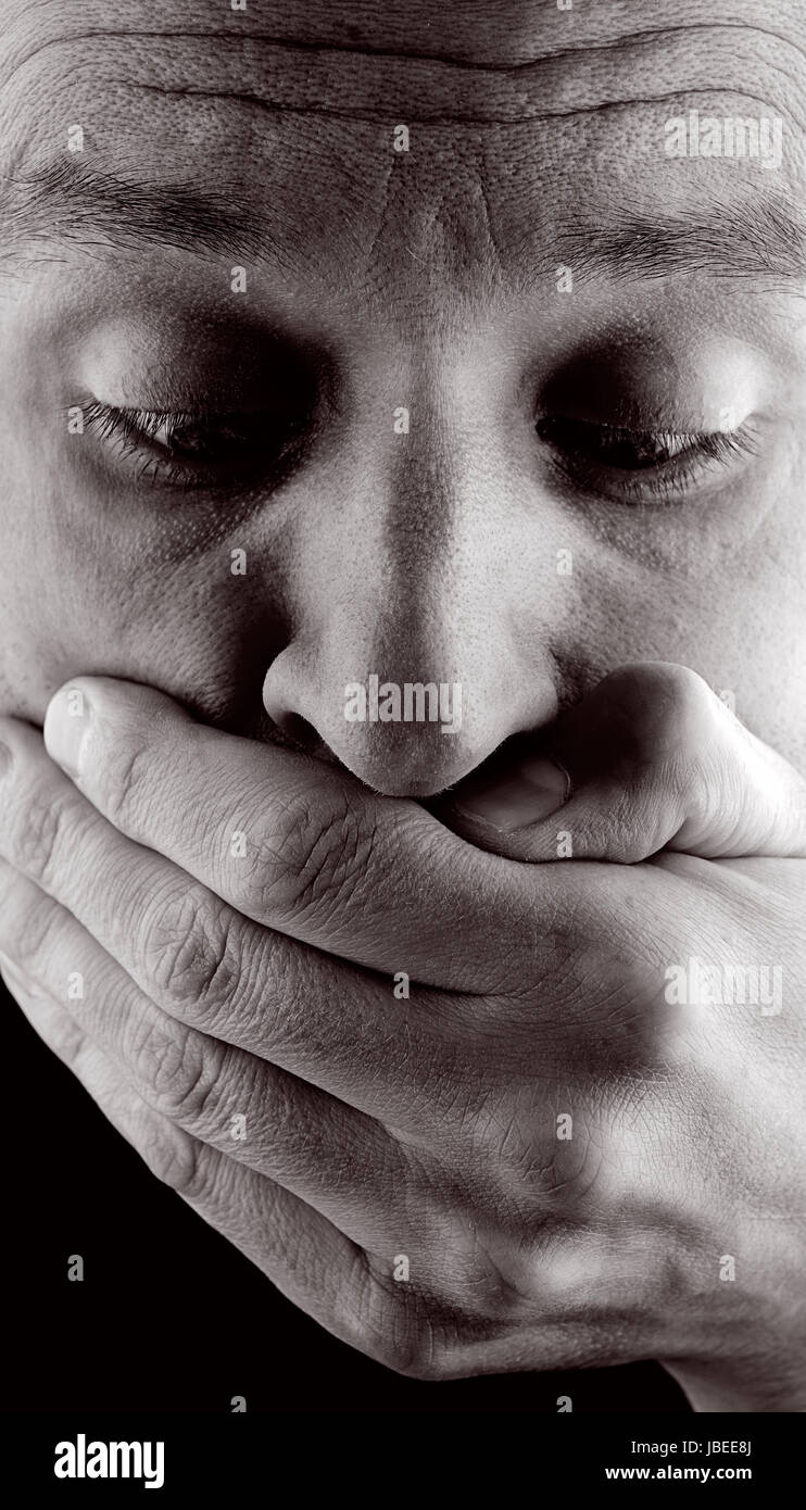 man holding her hand to the face Stock Photo - Alamy