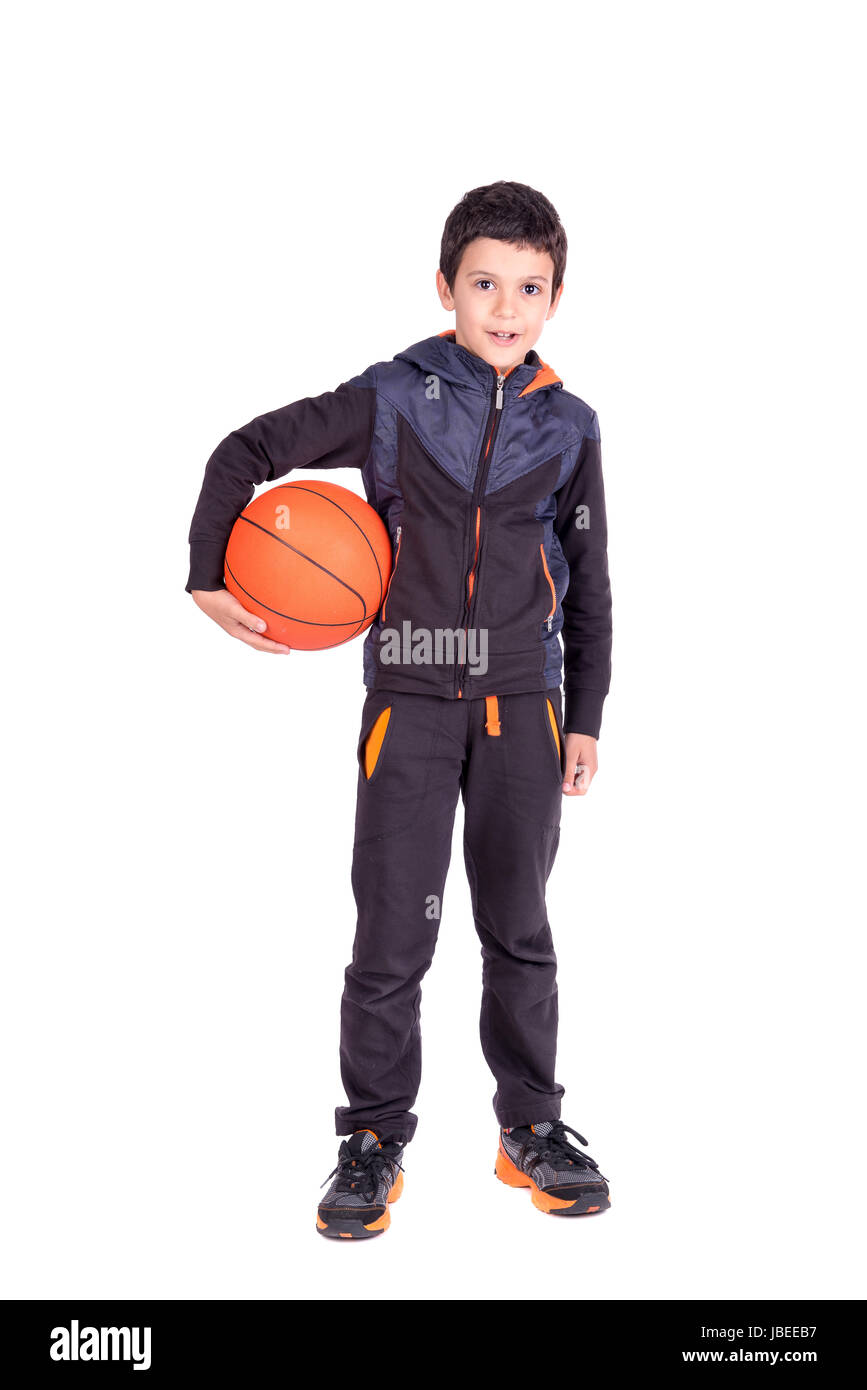 Young boy posing with a basketball ball isolated in white Stock Photo ...