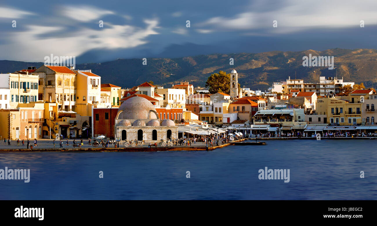 Panoramic view of the waterfront at Chania with mountains in the back ...