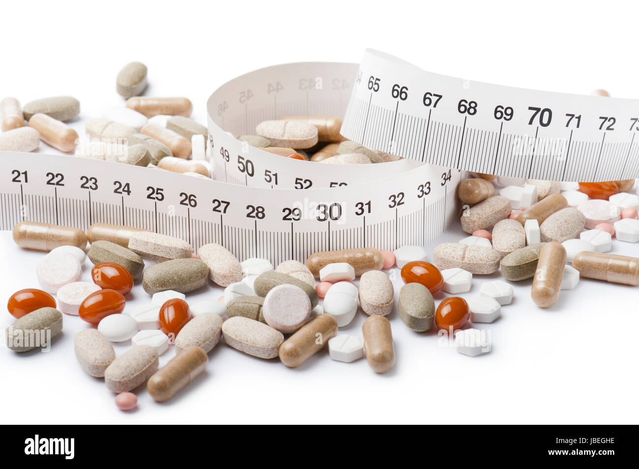 capsules for diet with pills, tablets and meter on white background ...
