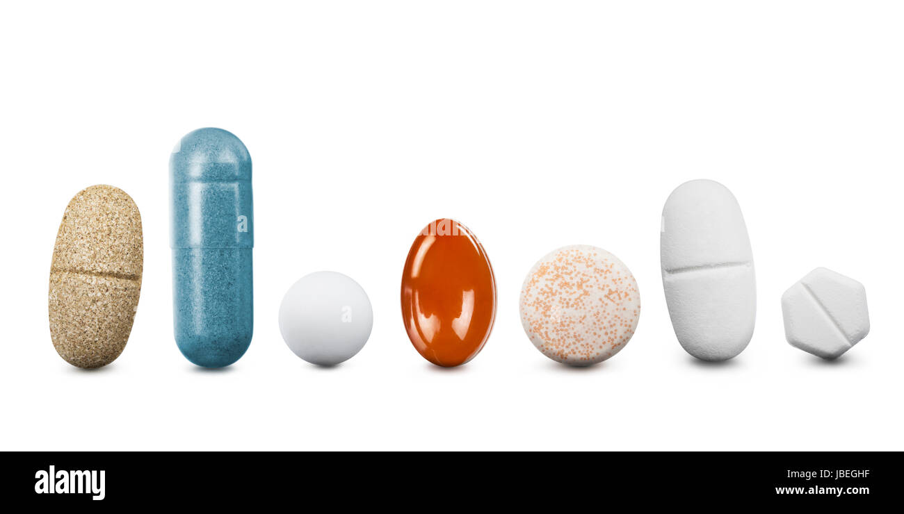 variety of colorfull pills and tablets on white background Stock Photo ...