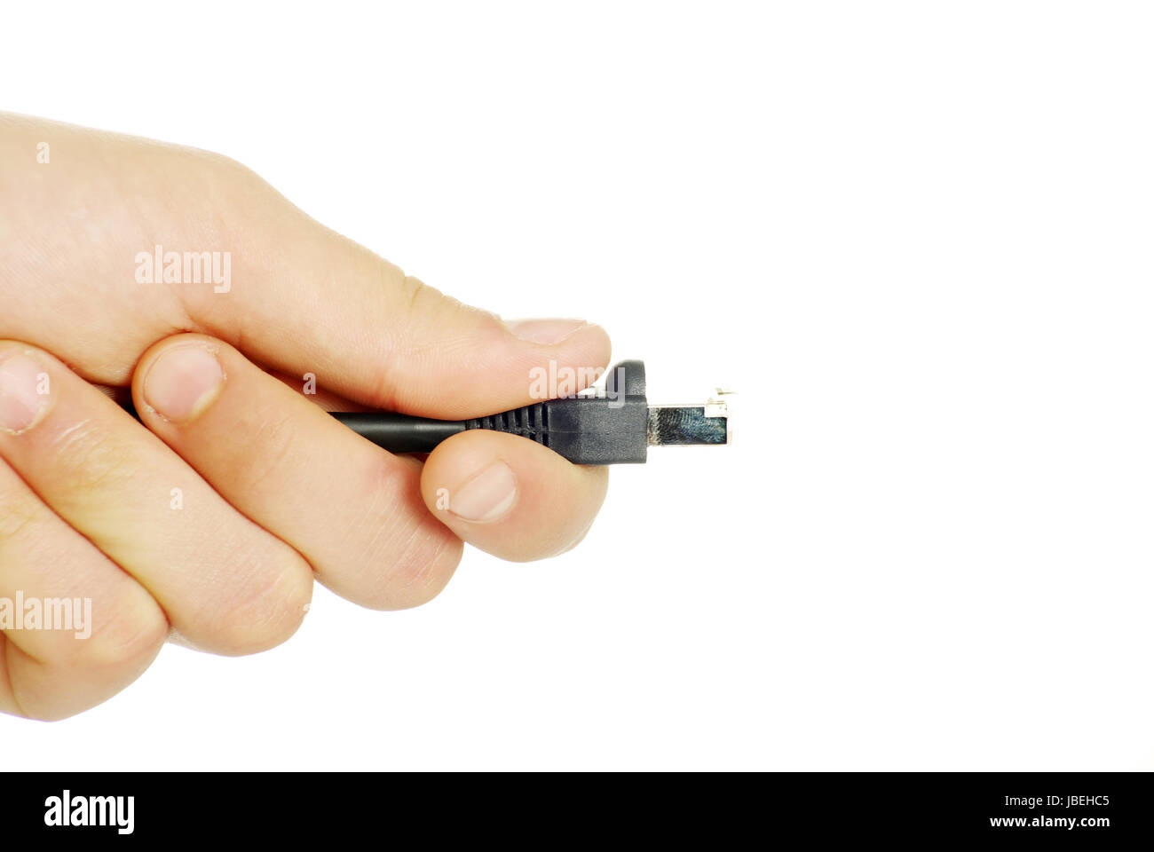 Computer cables in hand isolated on white background Stock Photo - Alamy