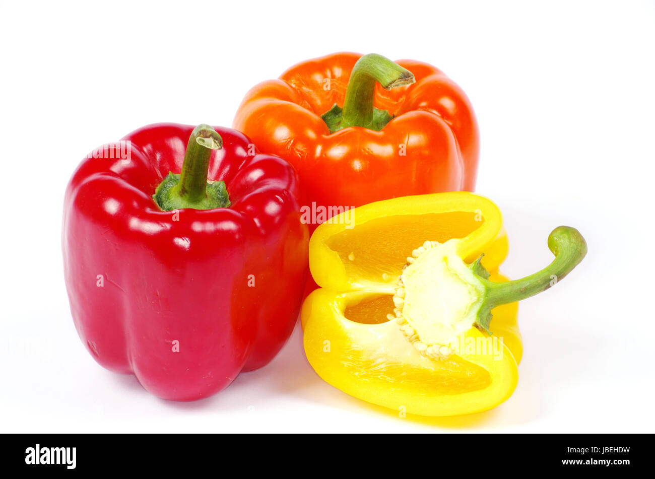 Colored pepper isolated on a white background Stock Photo - Alamy