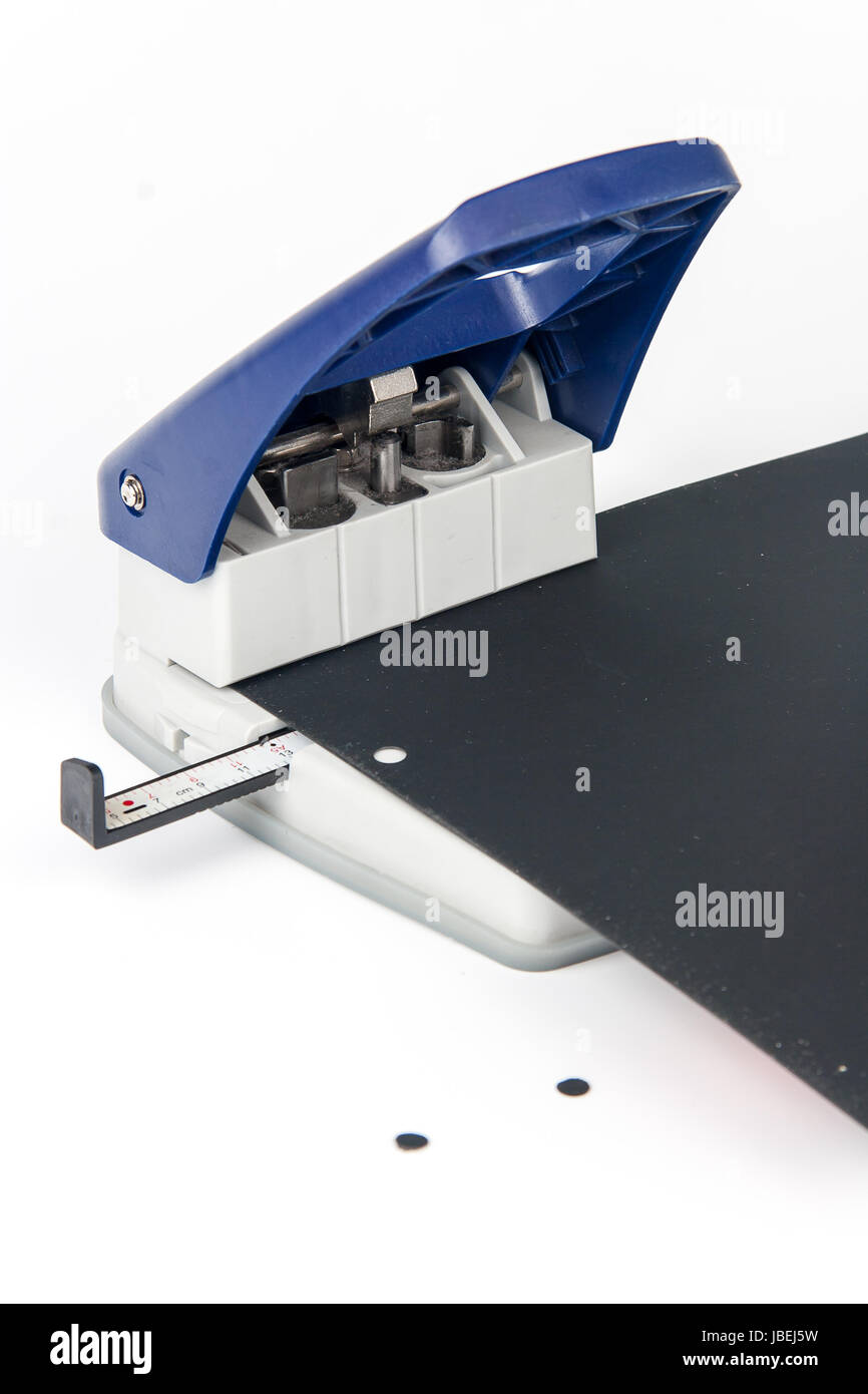 Office Puncher Unit isolated on white background Stock Photo - Alamy