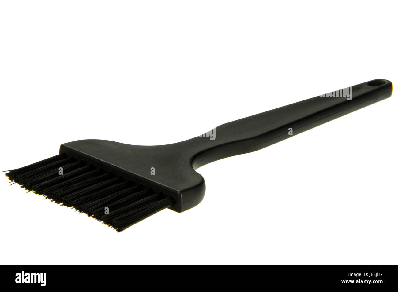 one black plastic brush isolated on the white background Stock Photo ...