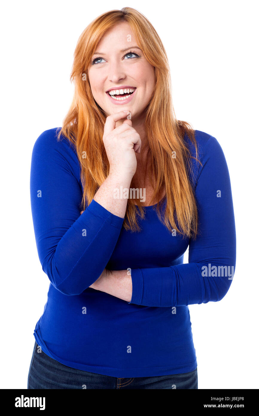 Woman recalling her golden memories and smiling Stock Photo - Alamy