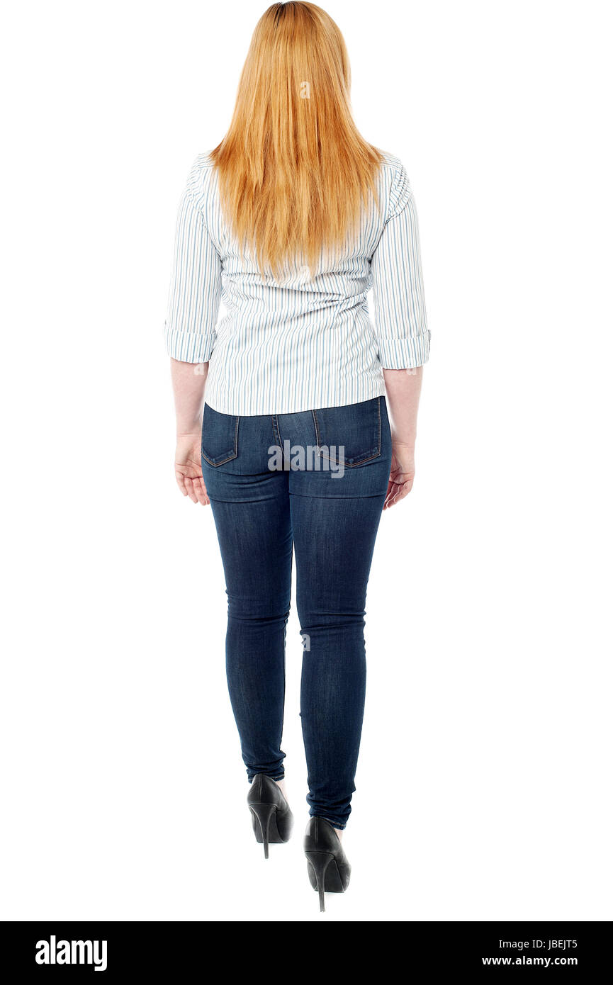 Young lady facing towards the wall Stock Photo - Alamy