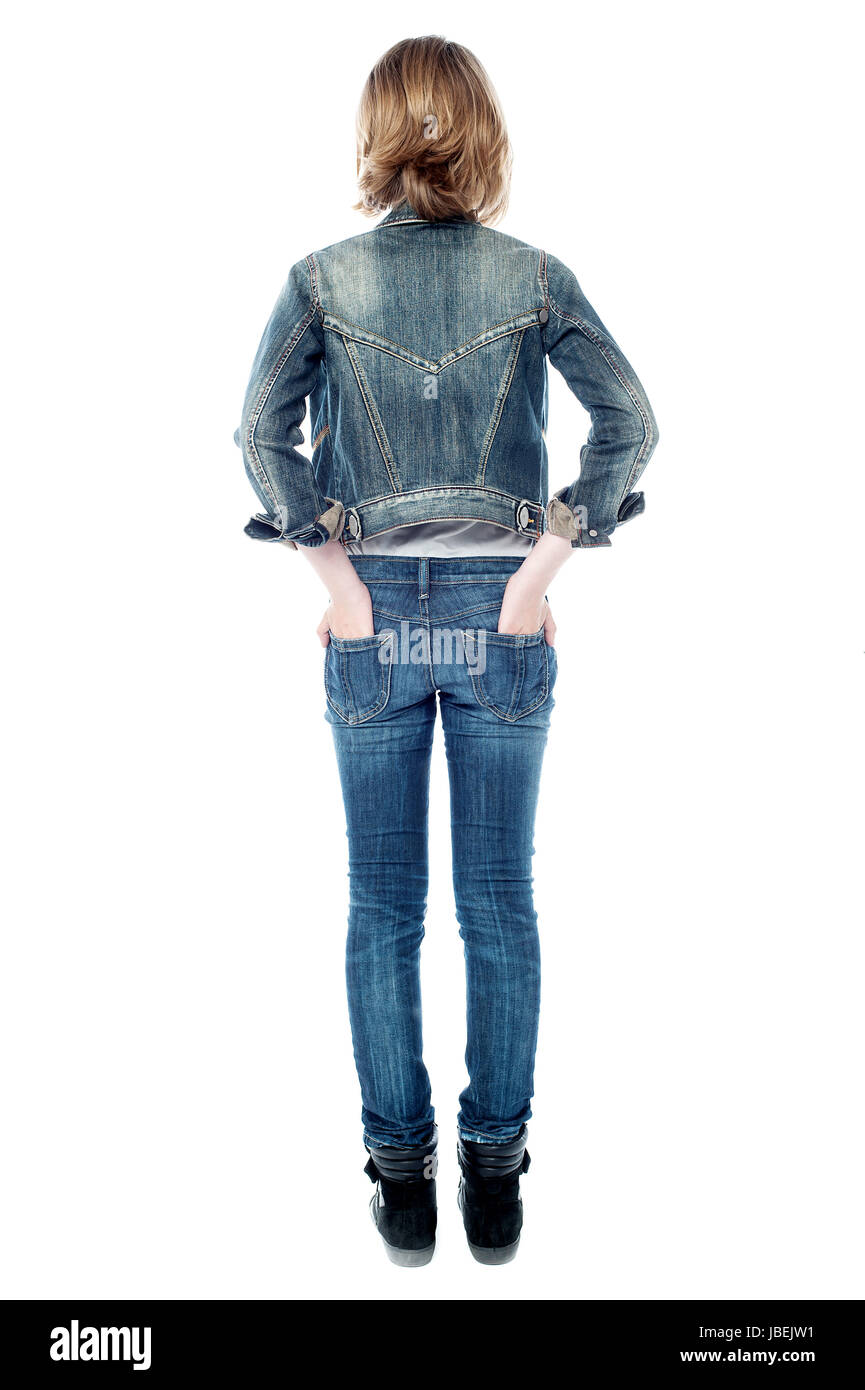 Stylish young girl with hands in back pocket Stock Photo - Alamy