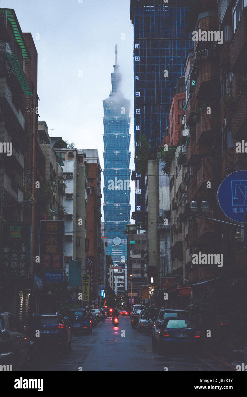 Taiwans iconic skyscraper Taipei 101 seen through a sidestreet Stock ...