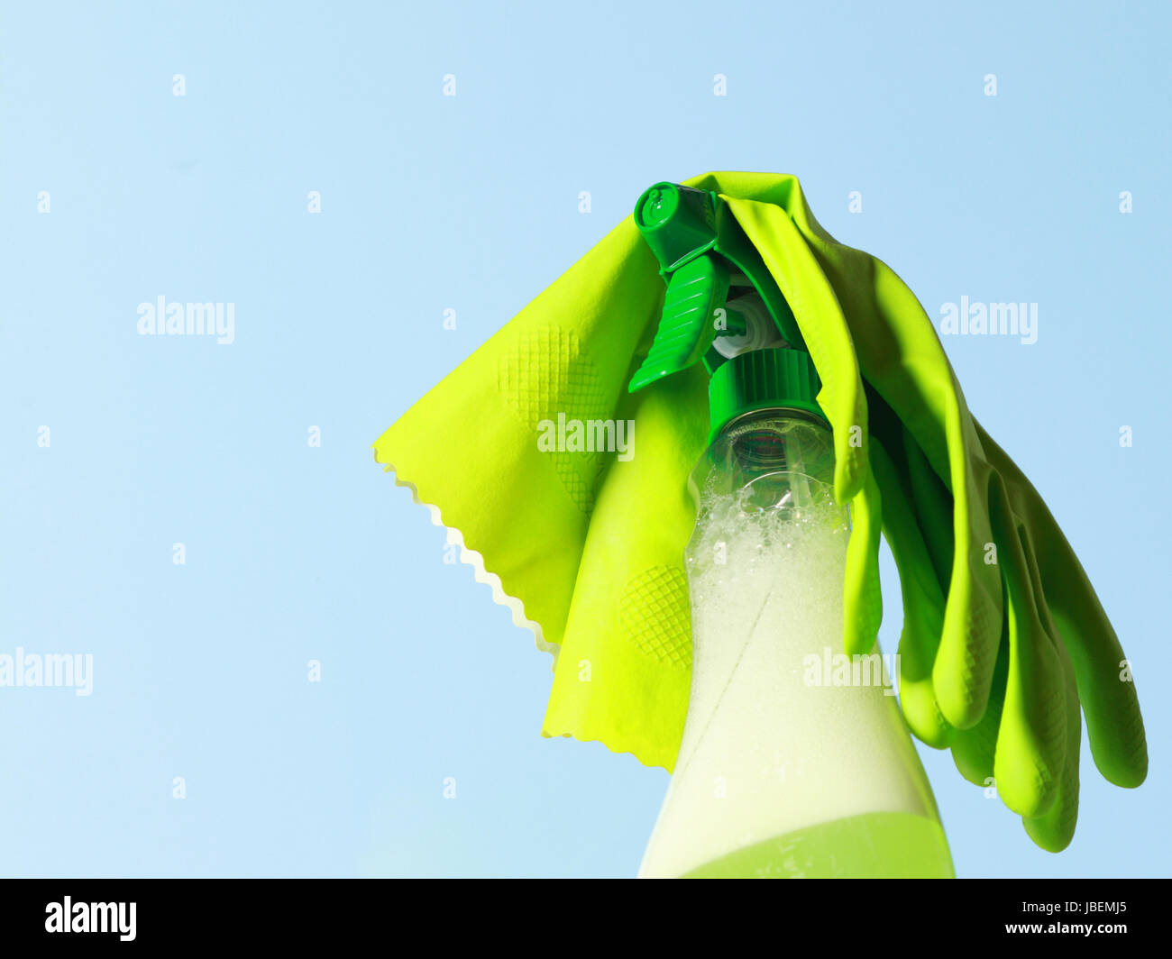 Cleaning window using tools - rag and spray detergent. Spring cleaning ...