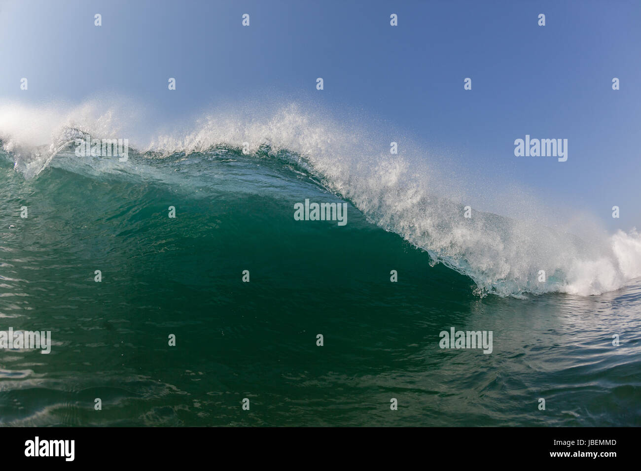 Ocean wave lip crashing towards shallows with power energy of nature ...