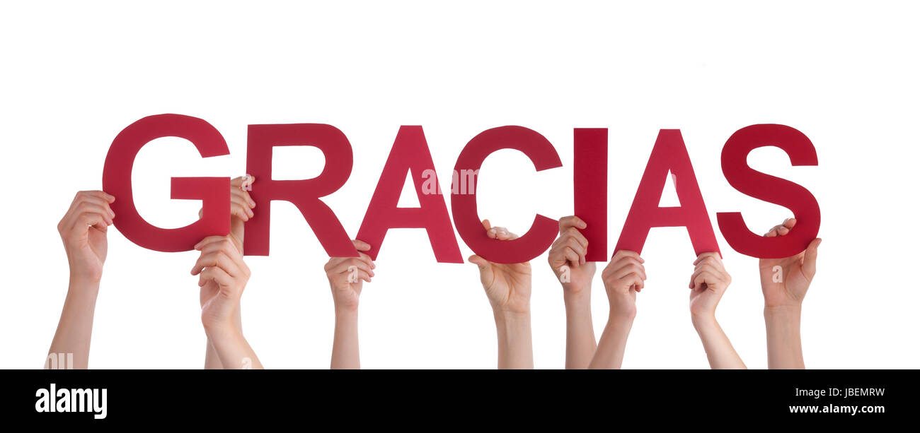 Many People Holding the Spanish Word Gracias, which means Thanks ...