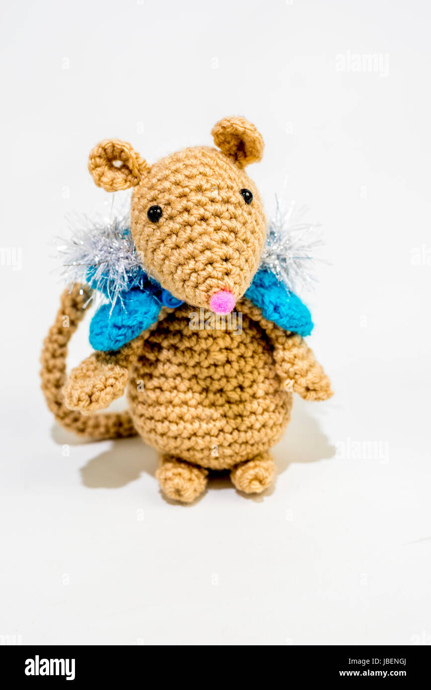 cute knitted mouse with cape, white background Stock Photo - Alamy