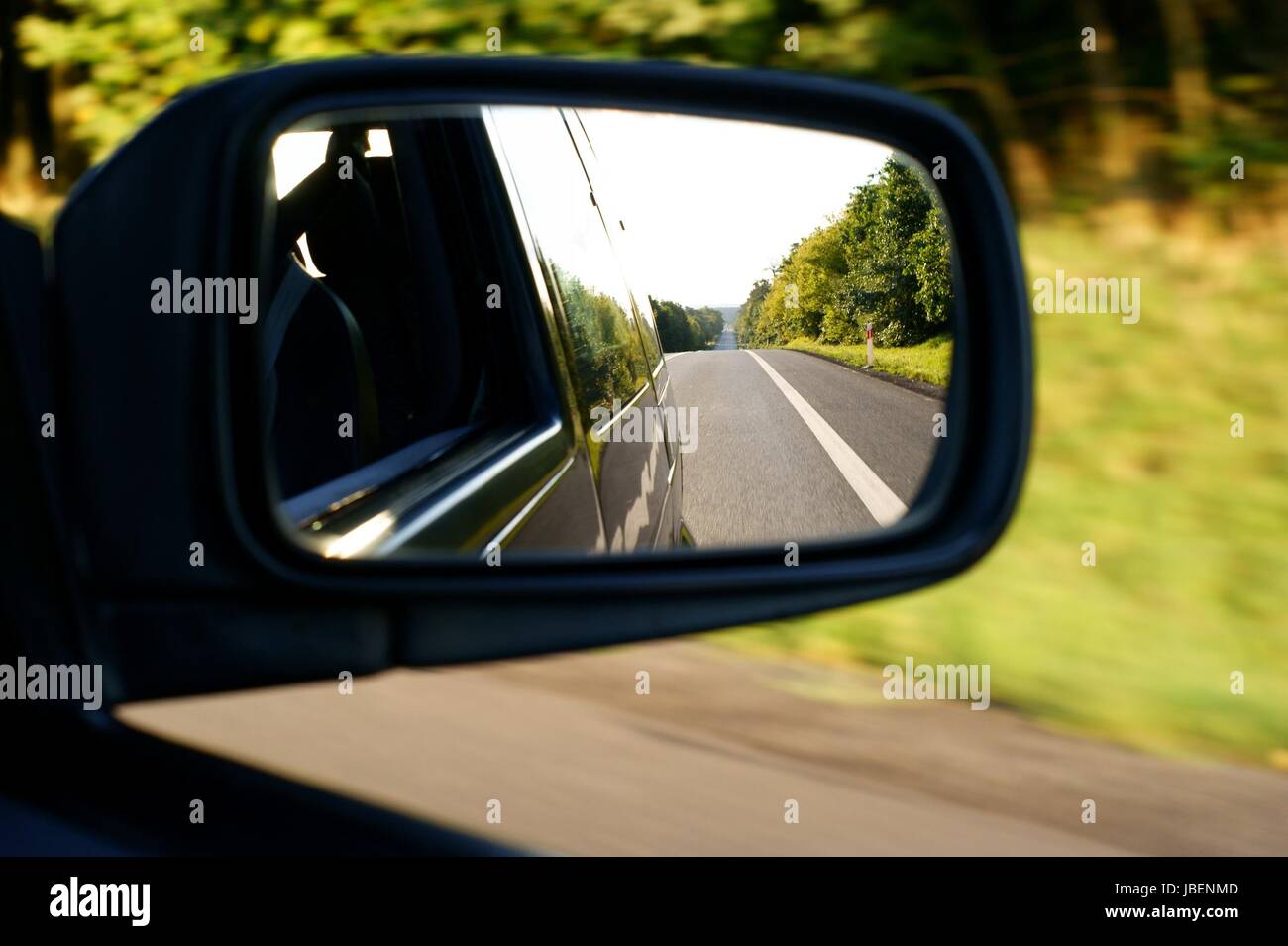 Landscape in the mirror of a car Stock Photo - Alamy