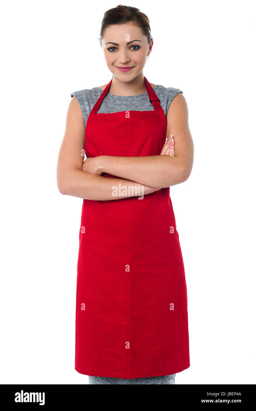 Attractive young female cook, arms crossed Stock Photo - Alamy