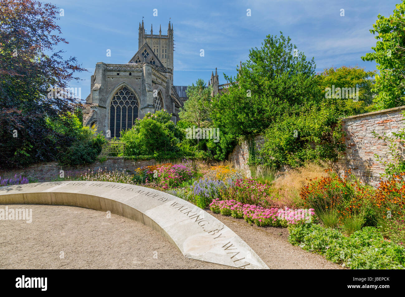 A colourful herbaceous border in Bishop Peter's Garden in a corner of ...