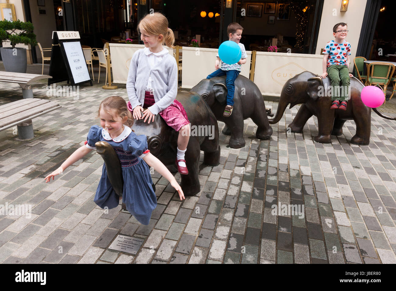 Child sat on art work hi-res stock photography and images - Alamy