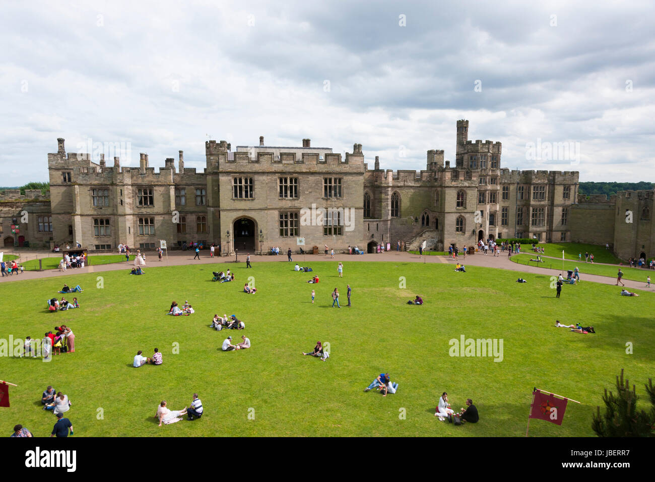 The central courtyard of Warwick castle in Warwickshire, UK. The chapel ...