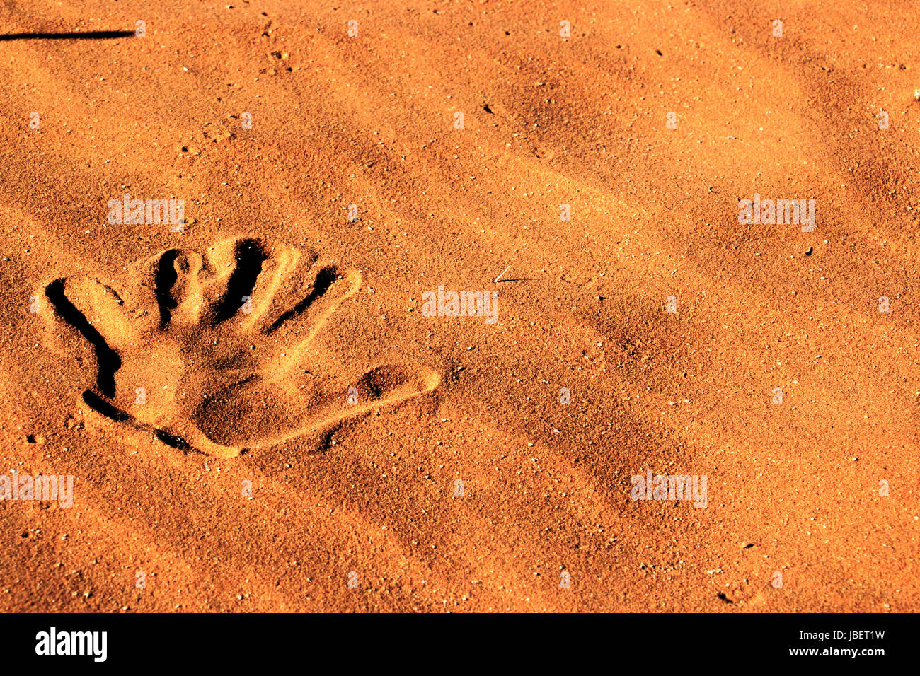 Finger print in sand hi-res stock photography and images - Alamy