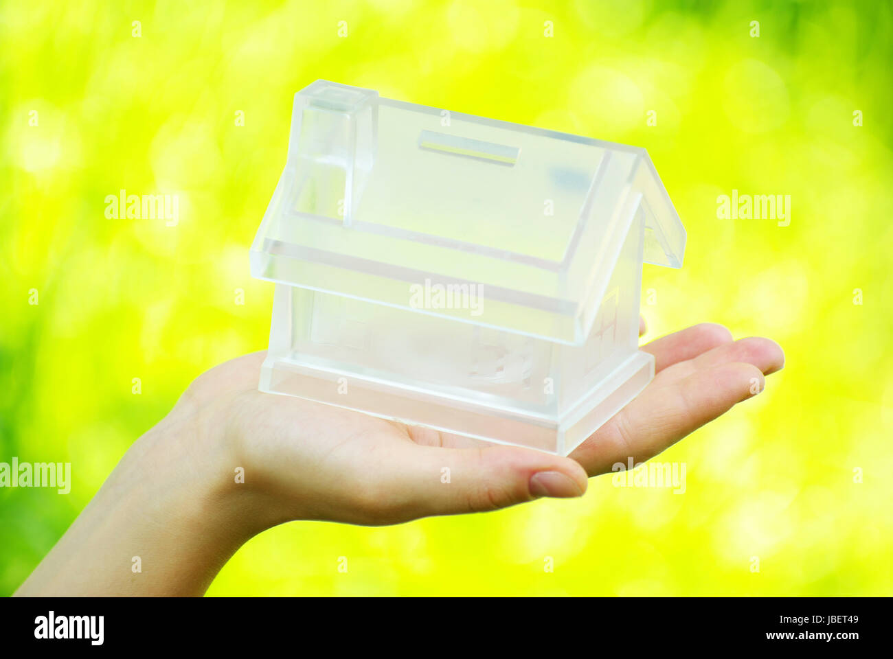 The house in human hand Stock Photo - Alamy