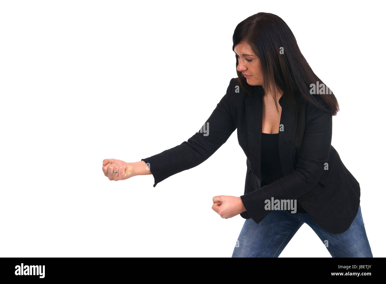Business woman pulling something Stock Photo - Alamy