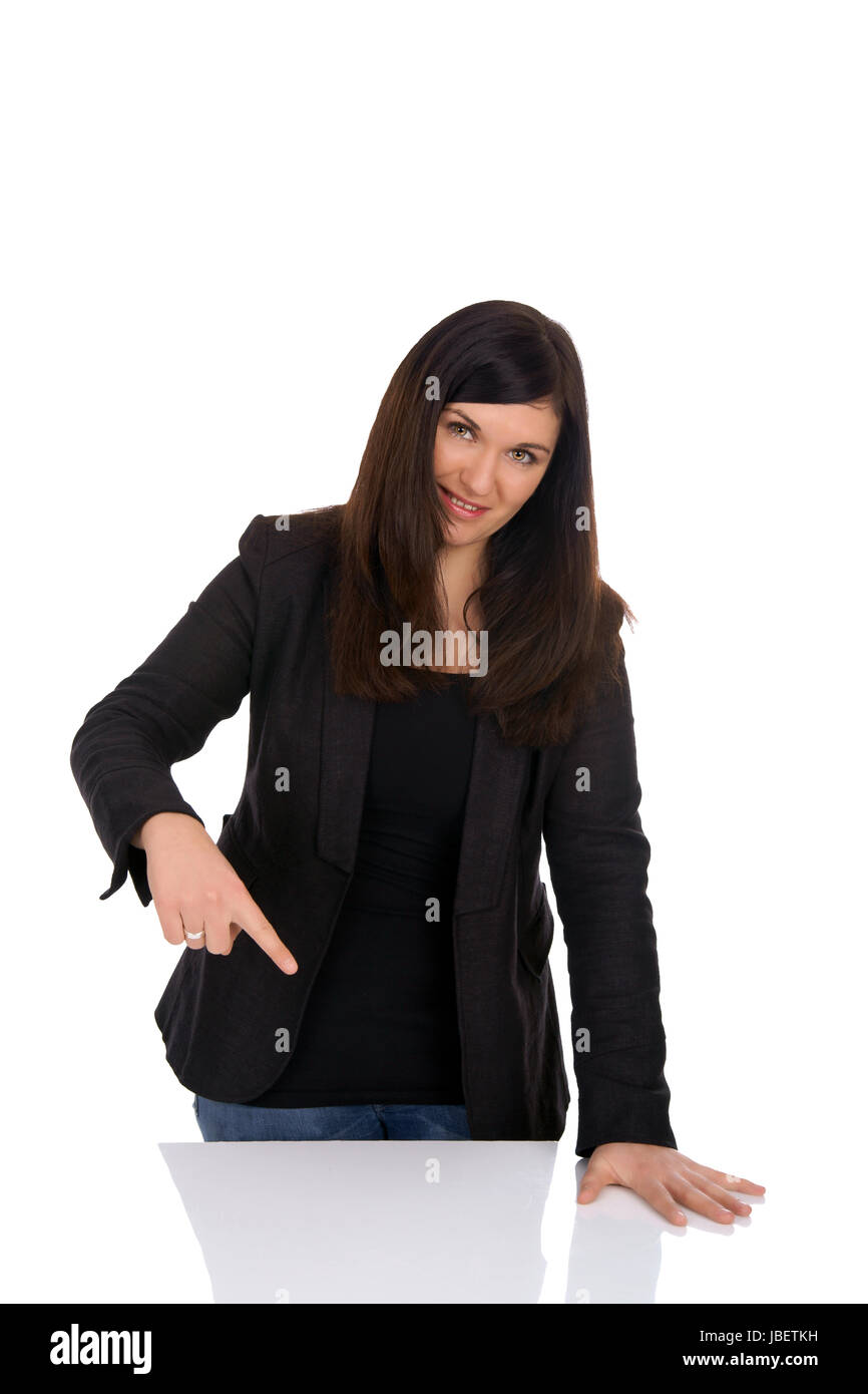 Business woman pointing with his finger on a table Stock Photo - Alamy