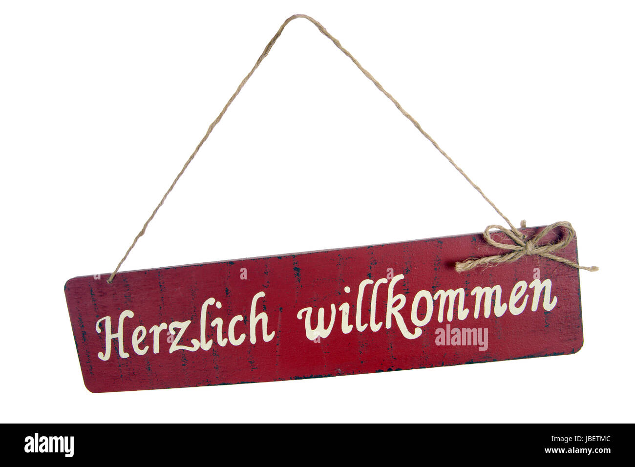 Sign with the german word Welcome Stock Photo - Alamy