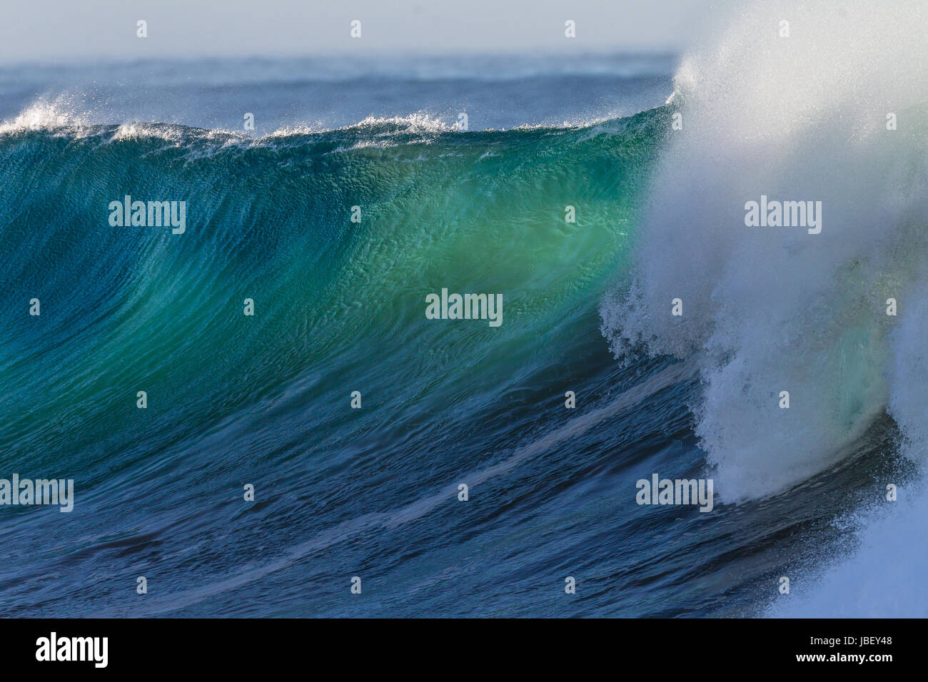 Surfers surfing cyclone swells of size at North New Piers Durban Stock ...