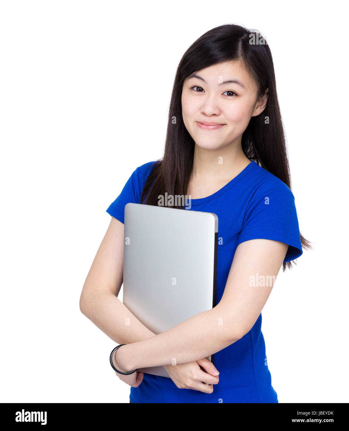 Asia woman holding computer Stock Photo - Alamy