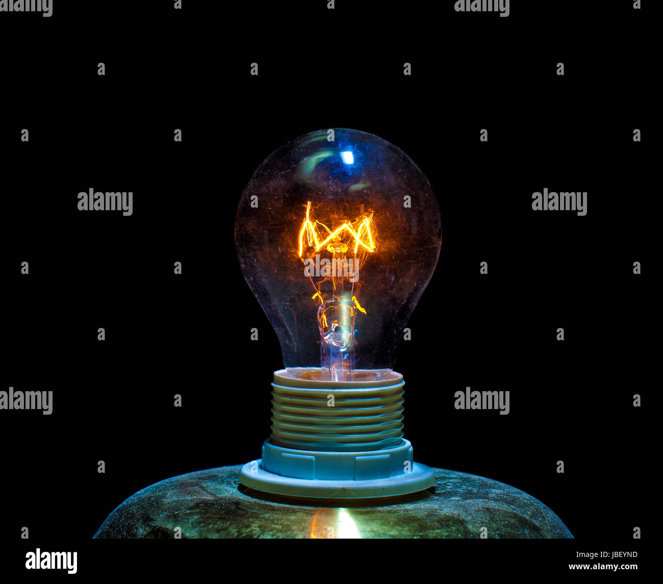 close up image of electric bulb on dark background Stock Photo - Alamy