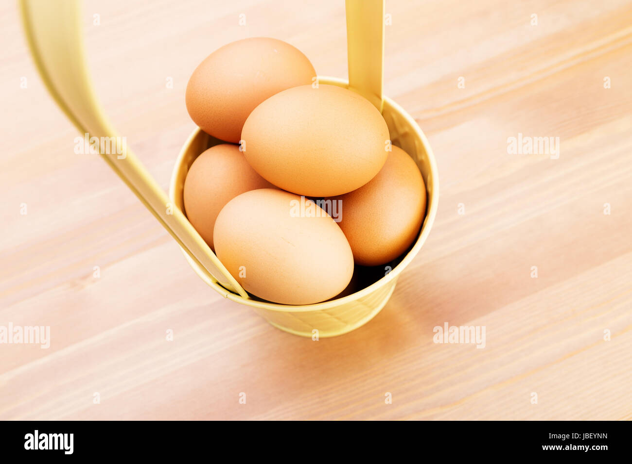 Egg in bucket Stock Photo - Alamy