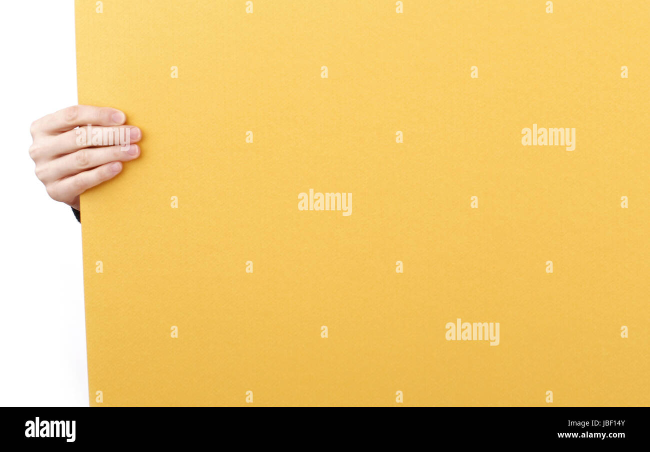 Human hand holding a piece of paper Stock Photo - Alamy