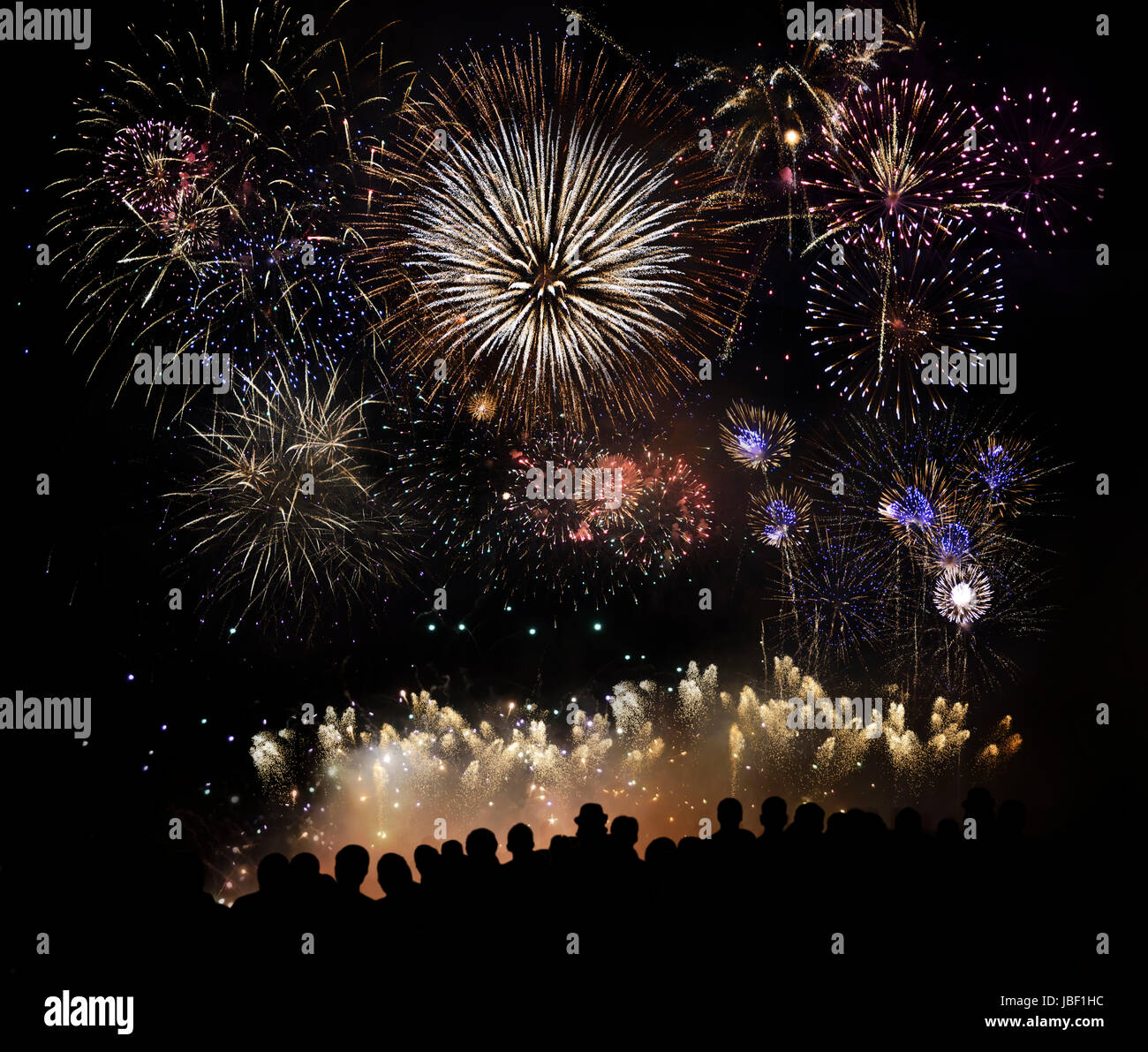 Group Of People Watching Beautiful Fireworks Stock Photo - Alamy