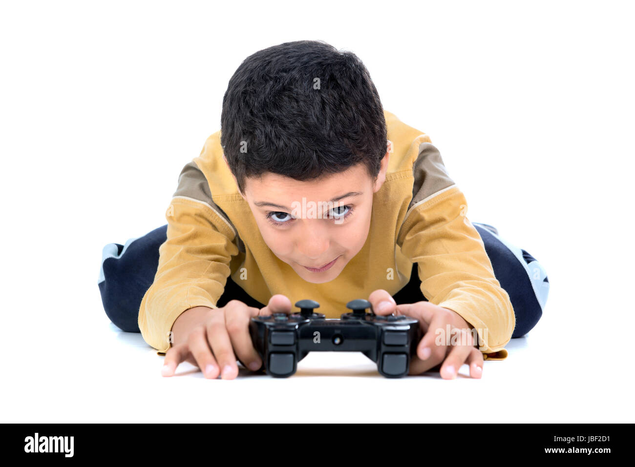 Boy playing video games isolated in white Stock Photo - Alamy