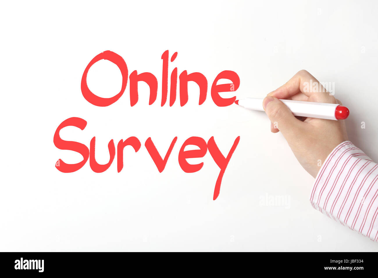 Writing online survey on whiteboard Stock Photo - Alamy