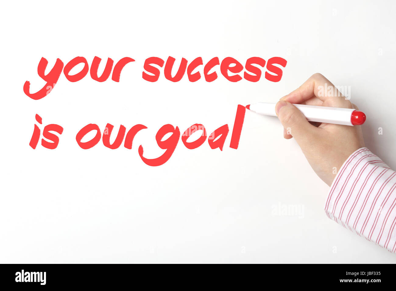 Writing your success is our goal word on whiteboard Stock Photo - Alamy