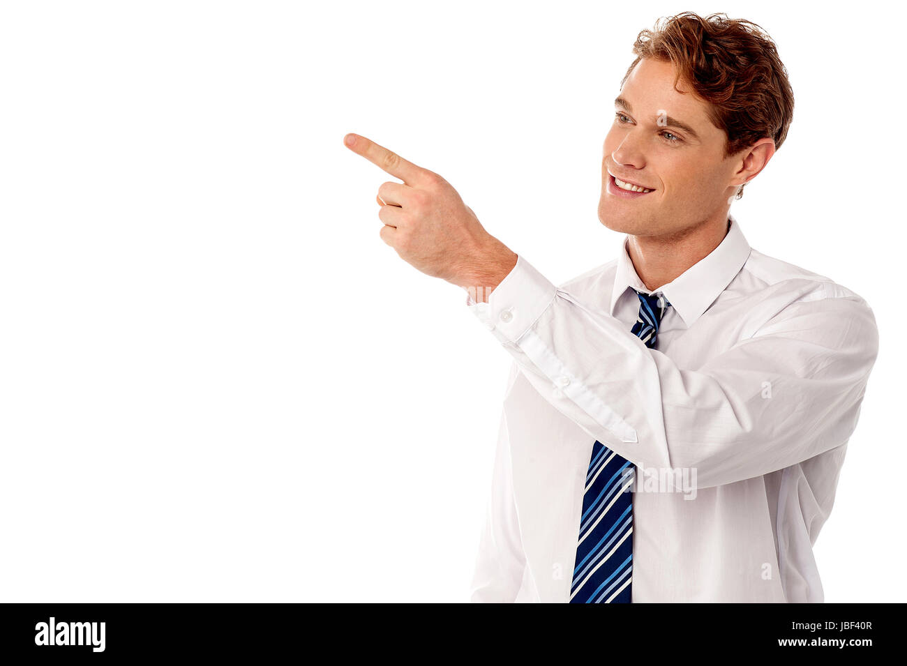 Corporate male looking and pointing away Stock Photo - Alamy