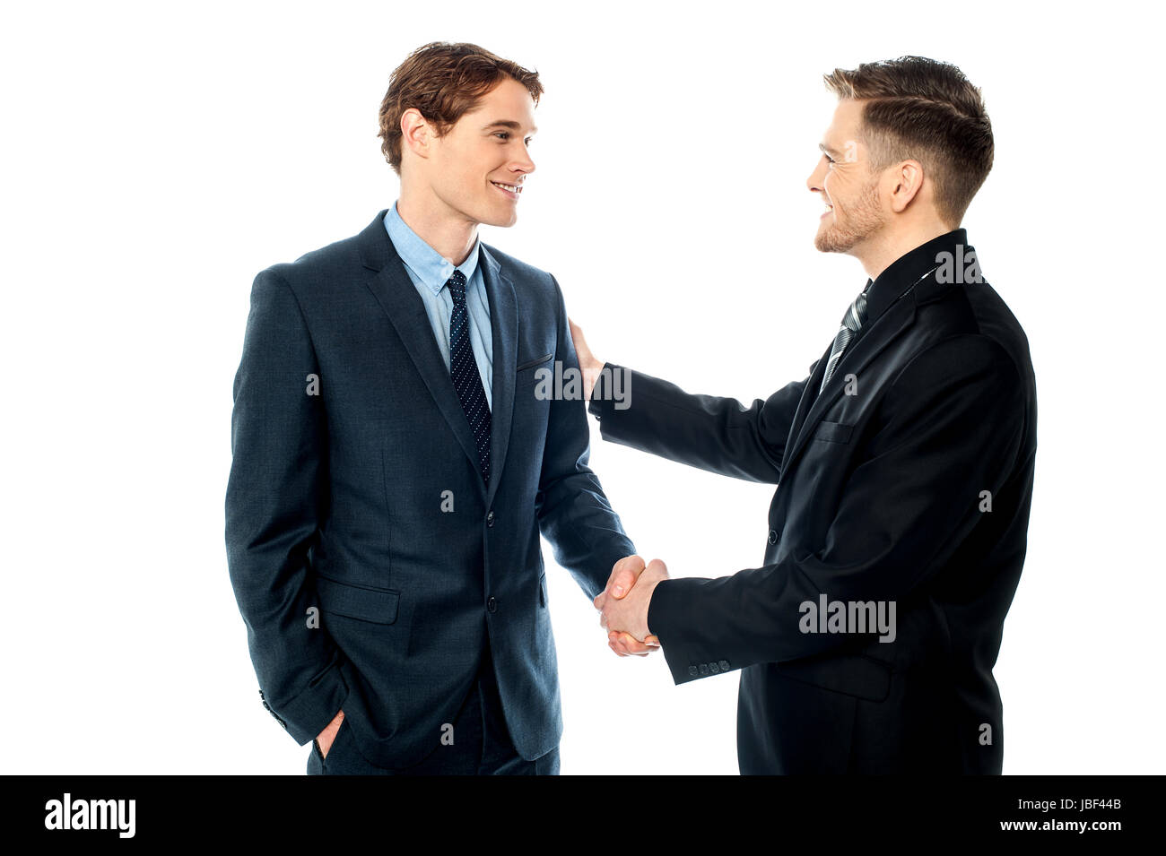 Business handshake of two successful partners Stock Photo - Alamy