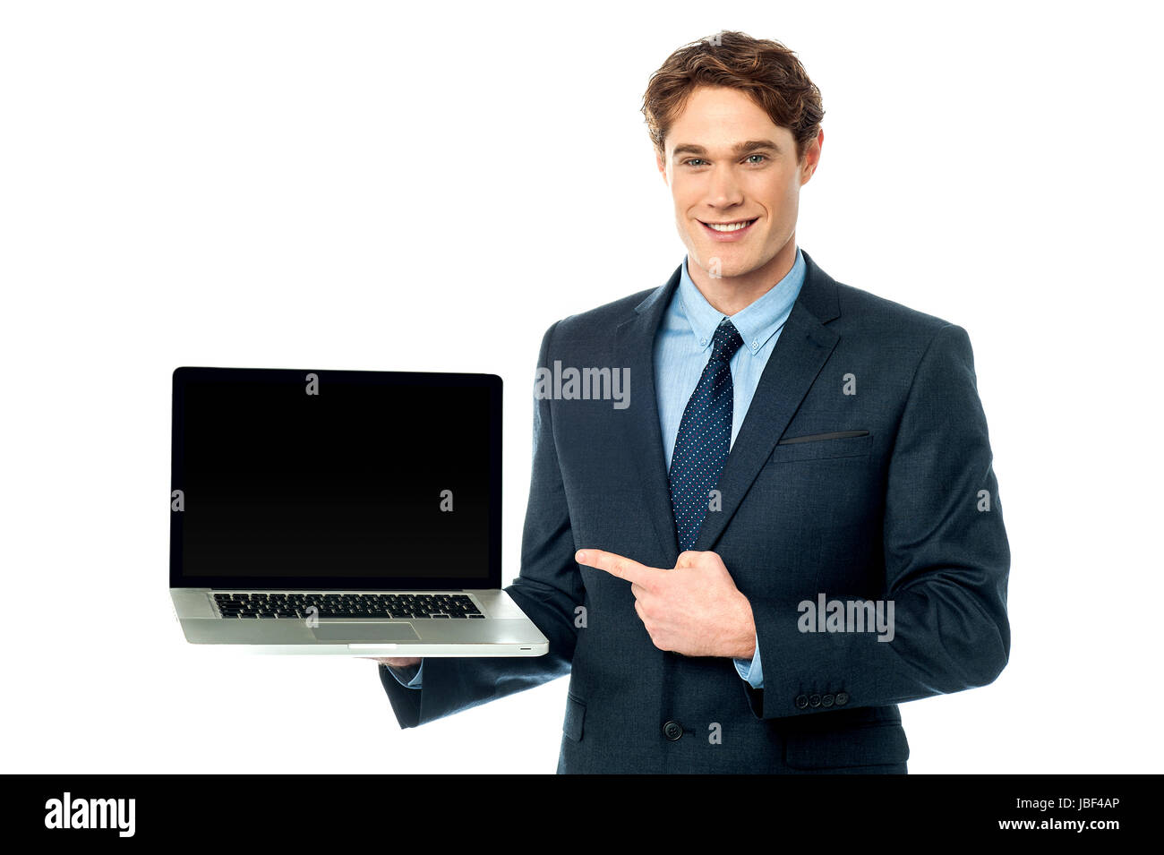 Salesman presenting brand new laptop Stock Photo - Alamy