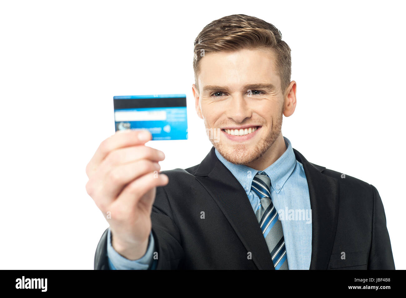 Young corporate guy showing his debit card Stock Photo - Alamy