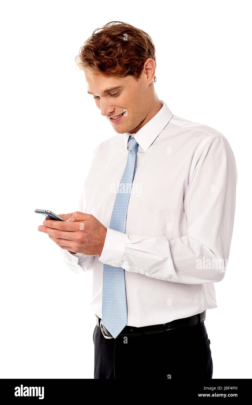 Corporate guy sending text messages Stock Photo - Alamy