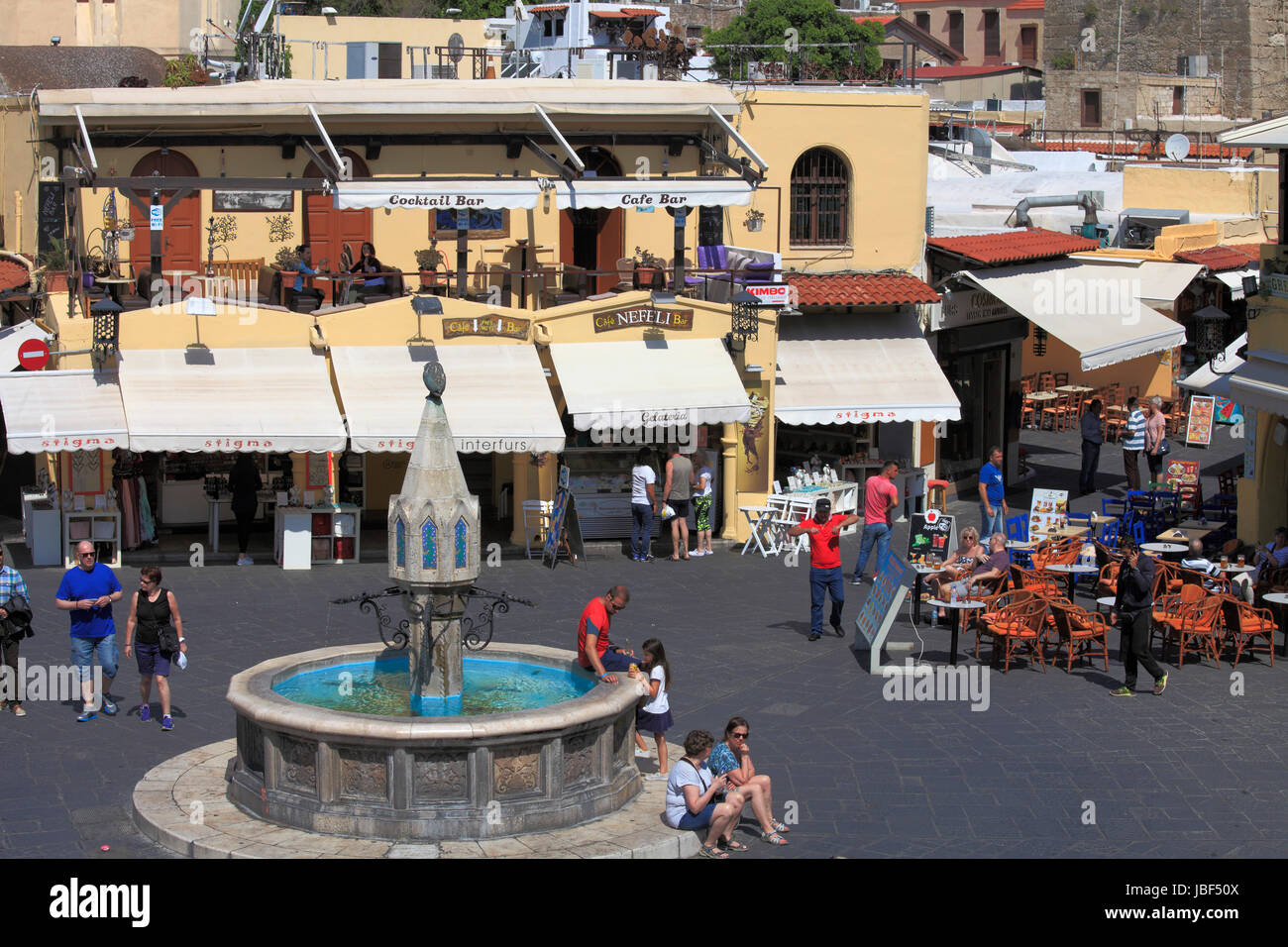 Greece, Dodecanese, Rhodes, Hippocratous Square, fountain, people Stock ...