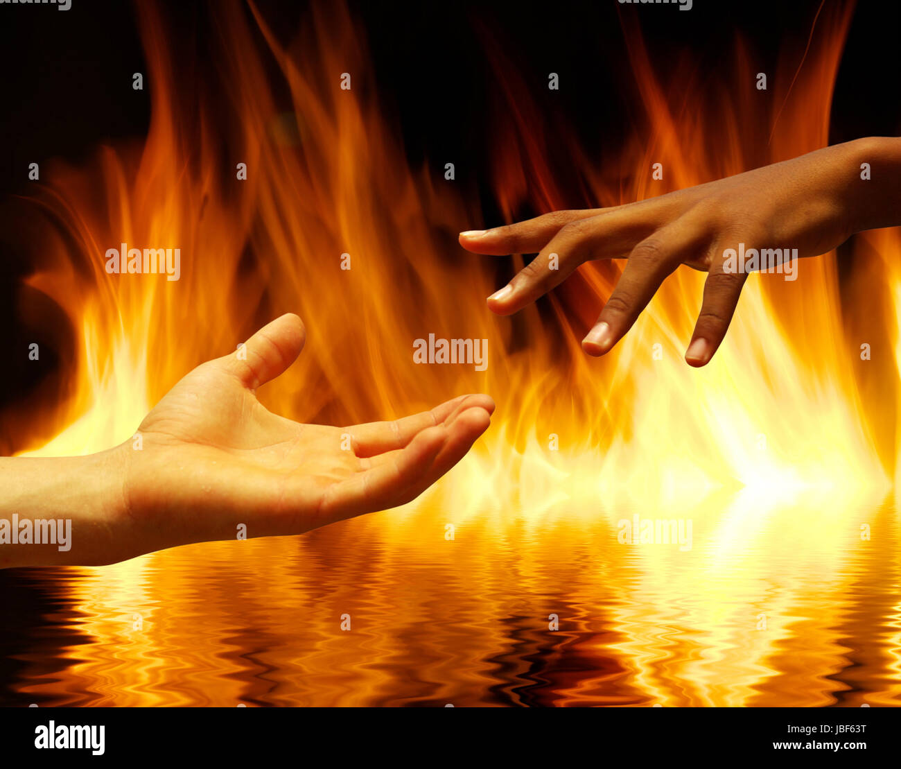 helping hand with the fire background Stock Photo - Alamy